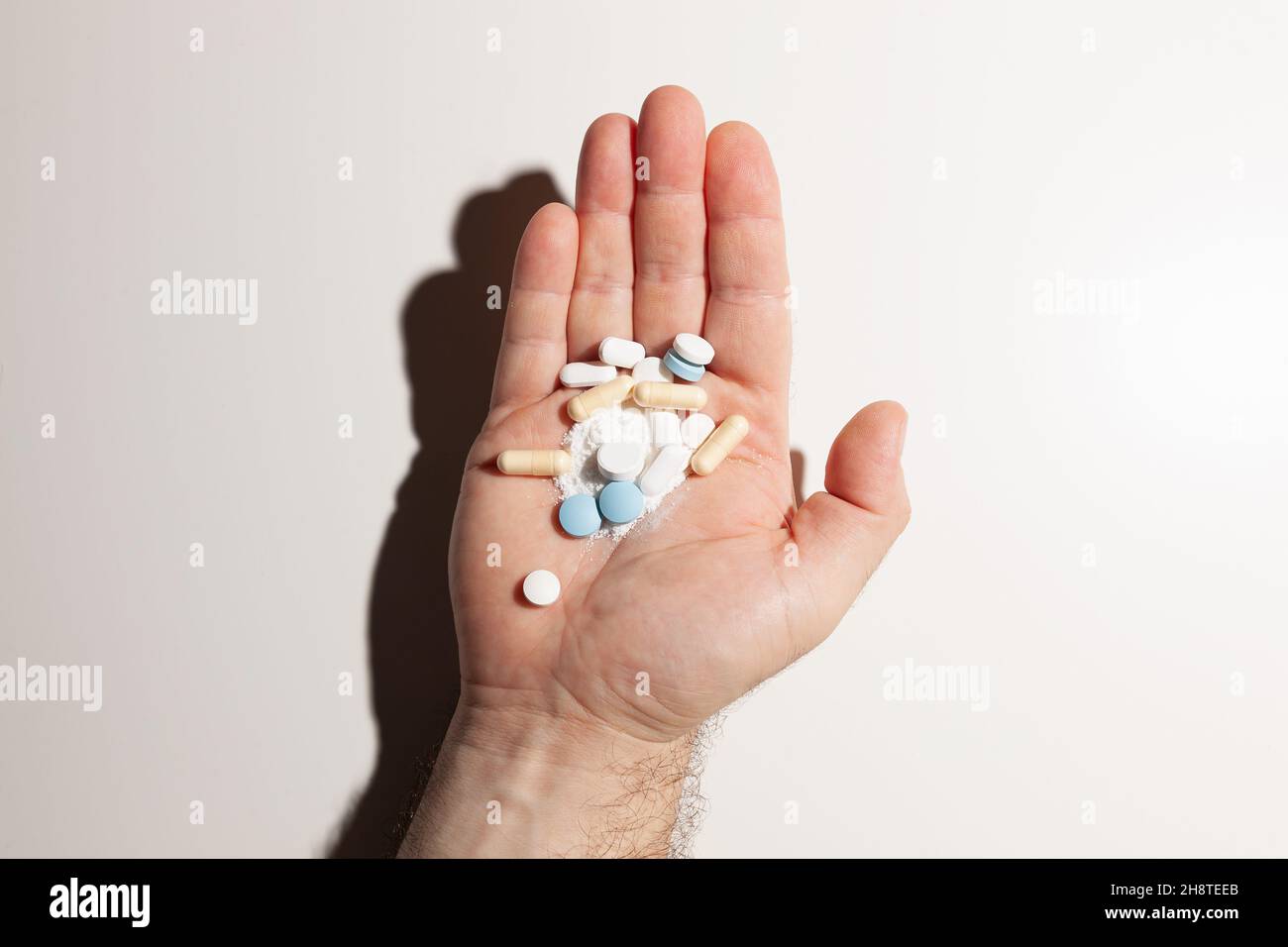 Hand assortment pills hi-res stock photography and images - Alamy