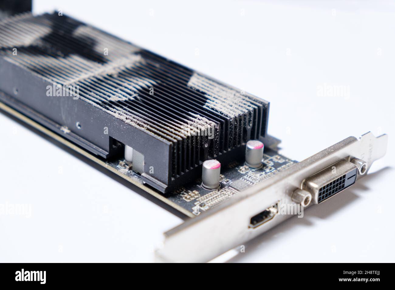 Dirty dusty graphics card in dust on a white background Stock Photo - Alamy