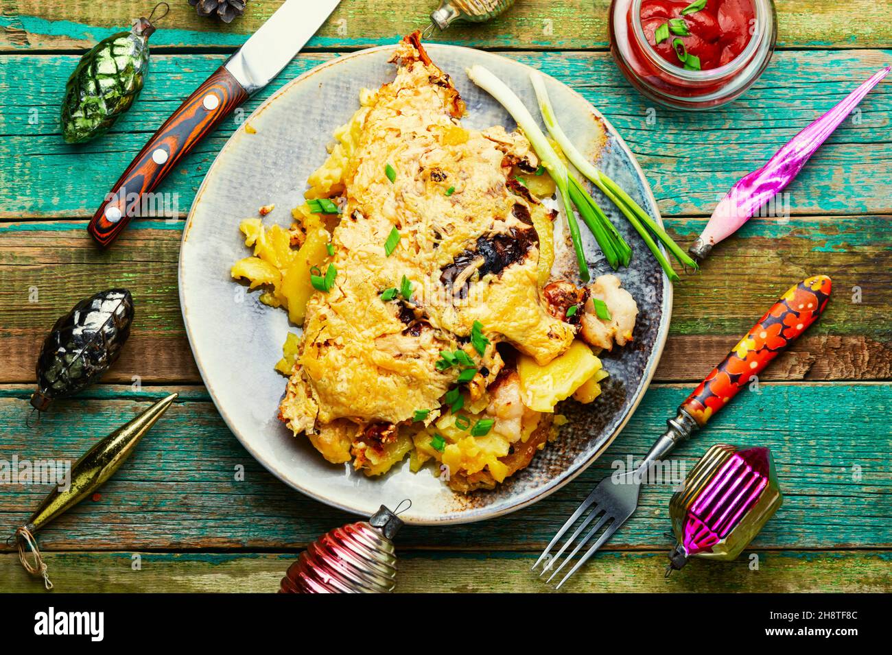 Veal, potato and cheese casserole. Meat gratin with potatoes and cheese ...