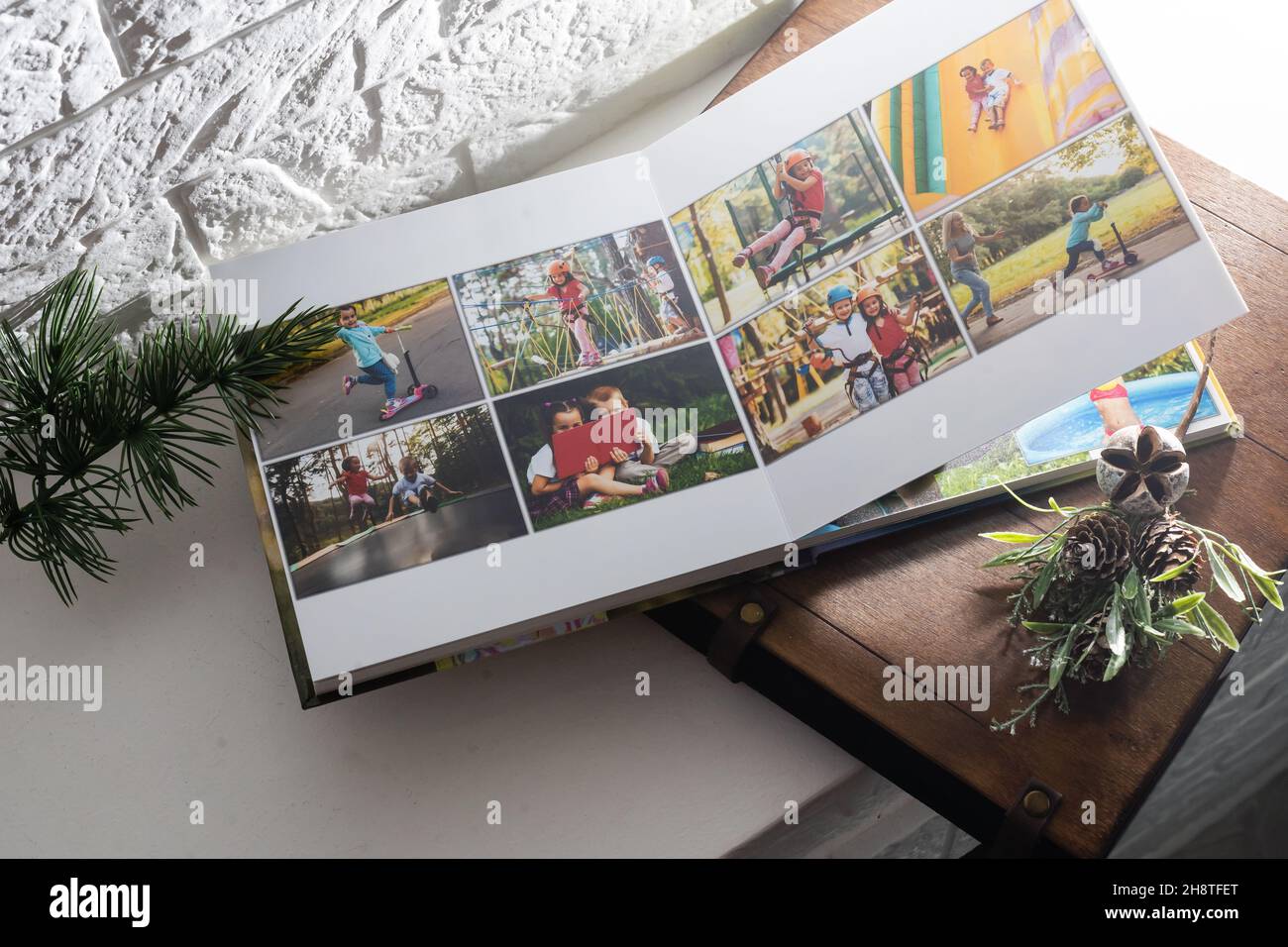 photo book with wooden cover. unfolded photobook. sample photobook ...