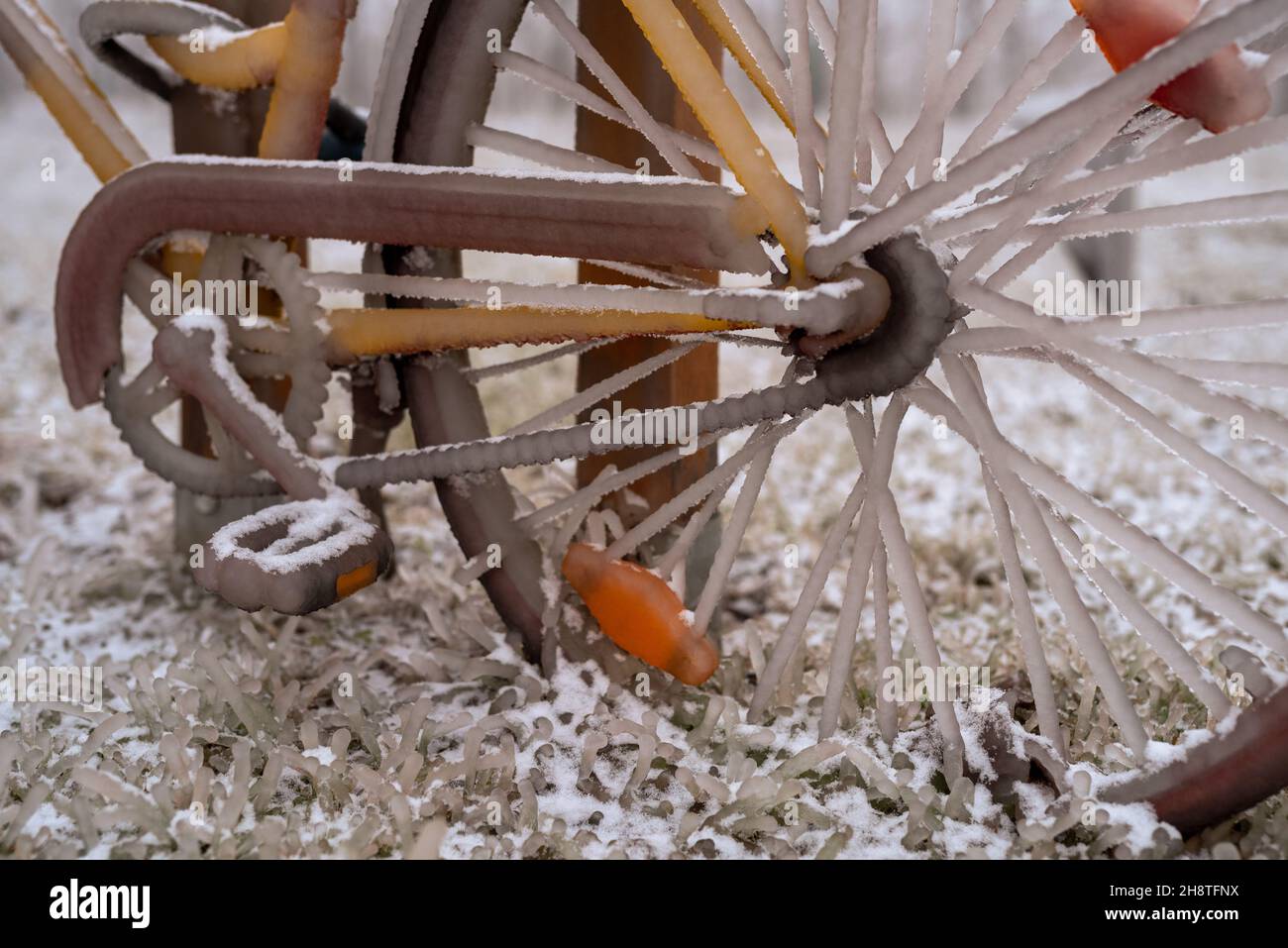 Frozen bike covered with ice. Frozen bike in the middle of wintry ...