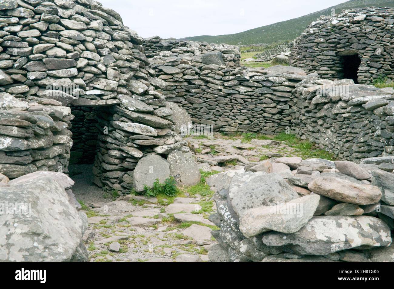 fahan beehive stone huts on the dingle peninsular in southern ireland ...