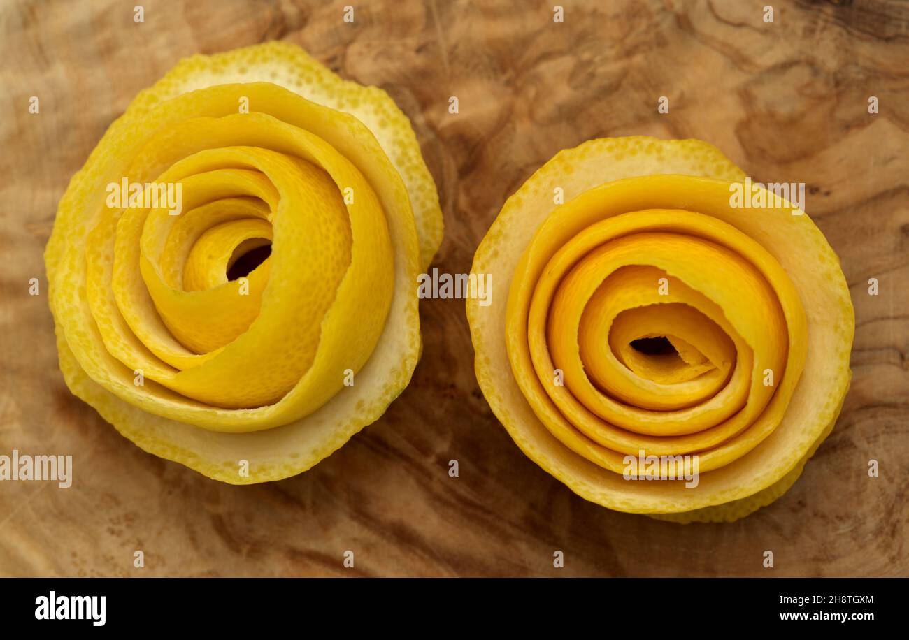 Using lemon peel to make Potpourri in the shape of roses Stock Photo ...