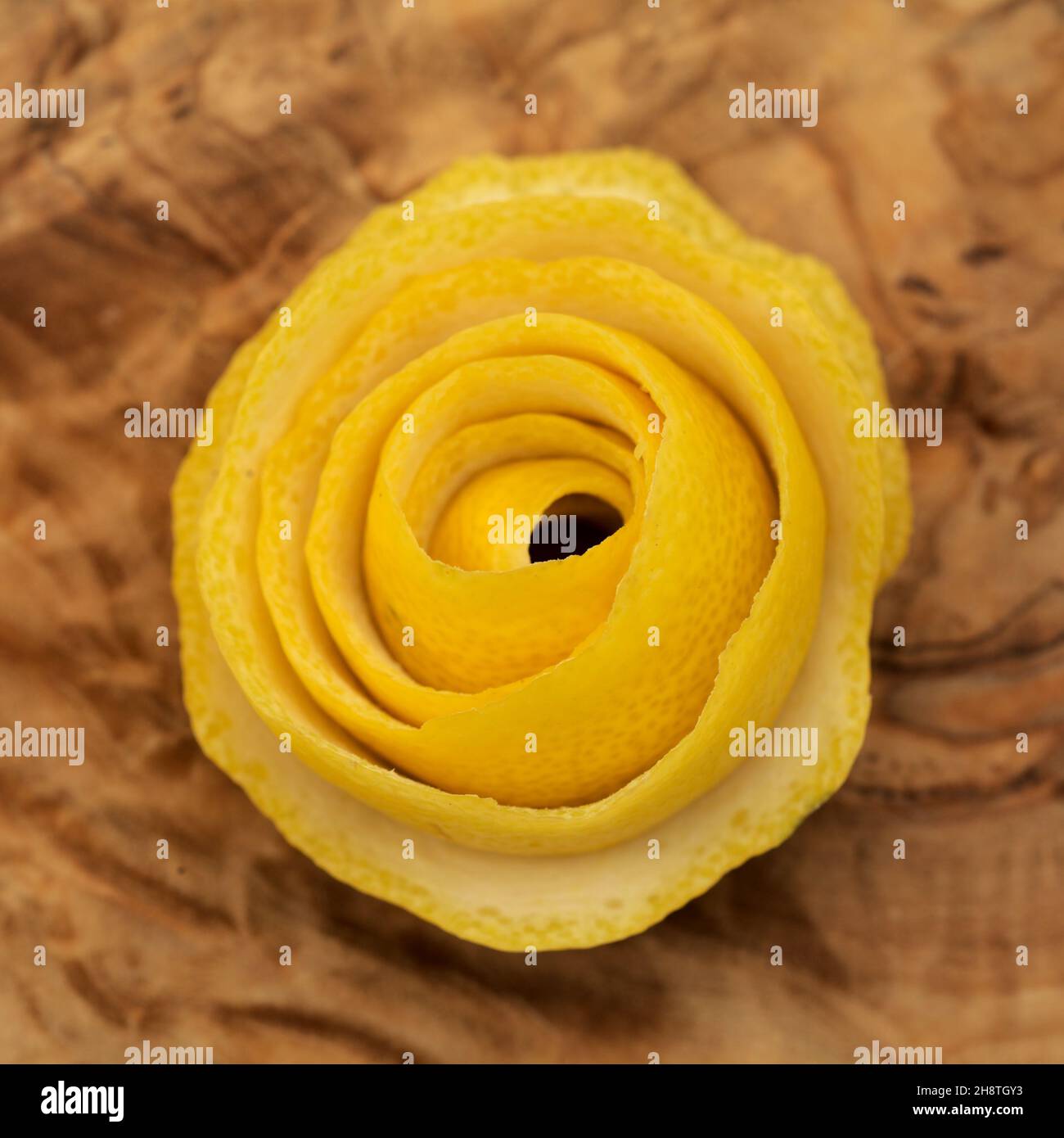 Using lemon peel to make Potpourri in the shape of roses Stock Photo ...
