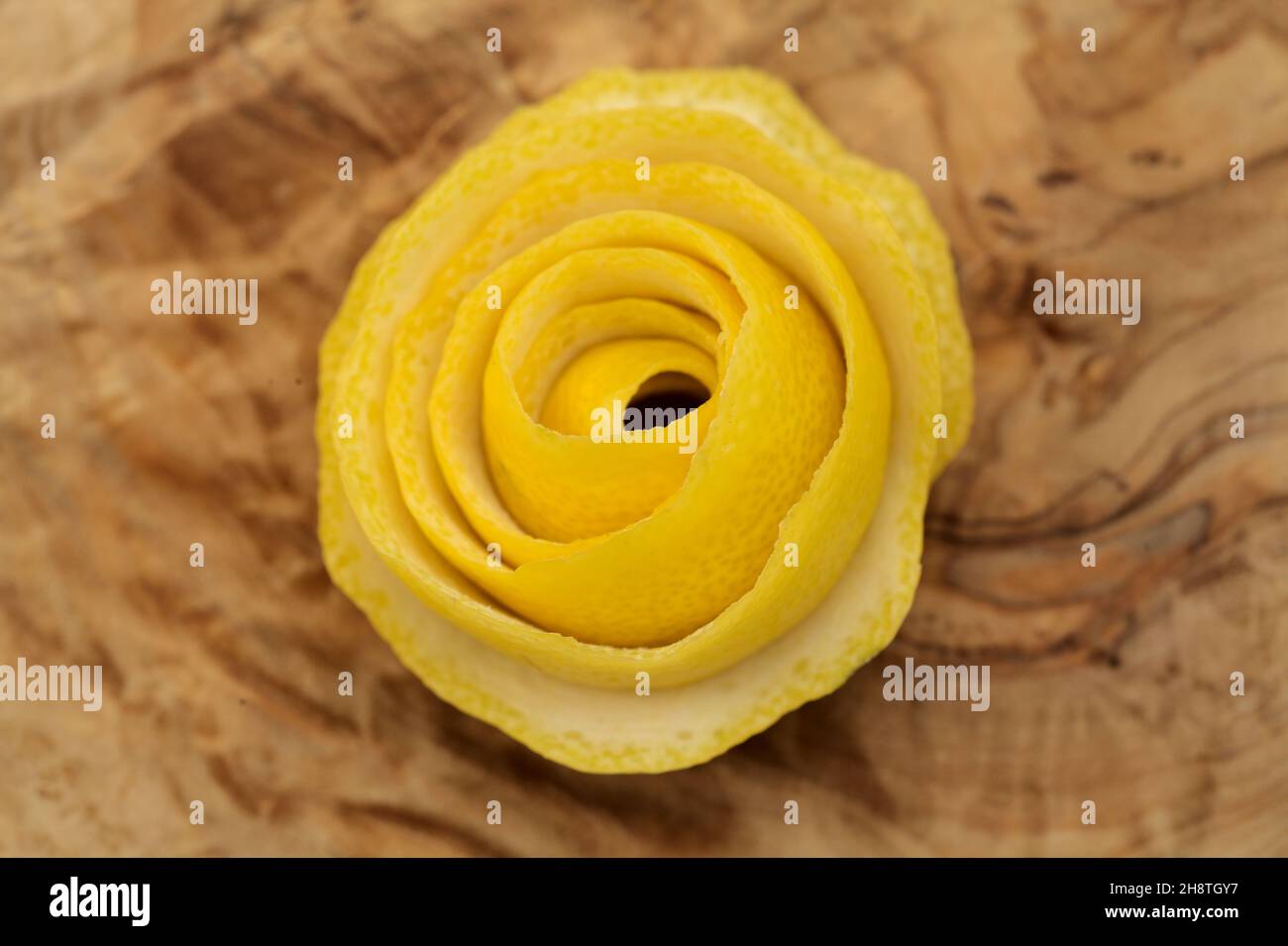Using lemon peel to make Potpourri in the shape of roses Stock Photo ...