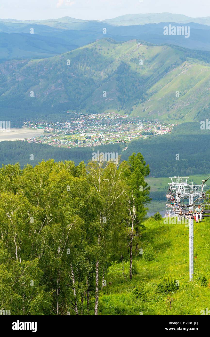 View from the ski lift on Mount Sinyukha near the village of Manzherok ...