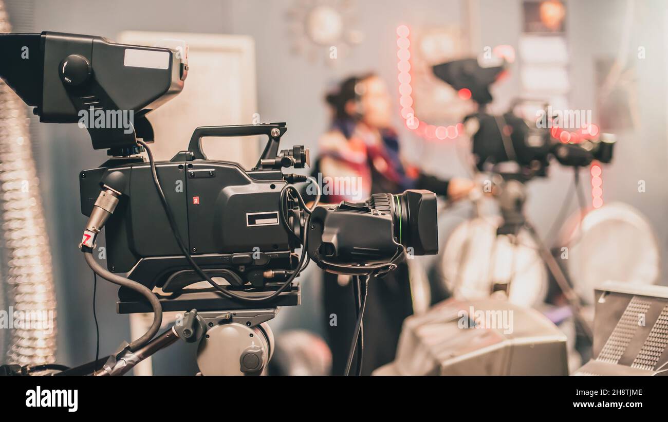 Behind the scene. Multiple camera setup. Cameraman shooting the film ...