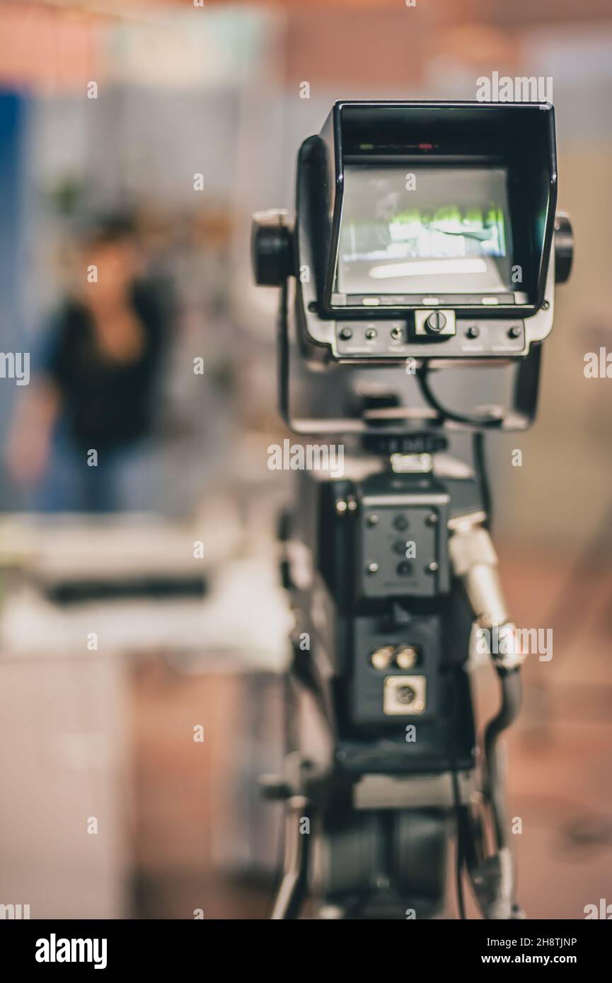 Behind the scene. Film camera in film studio Stock Photo - Alamy