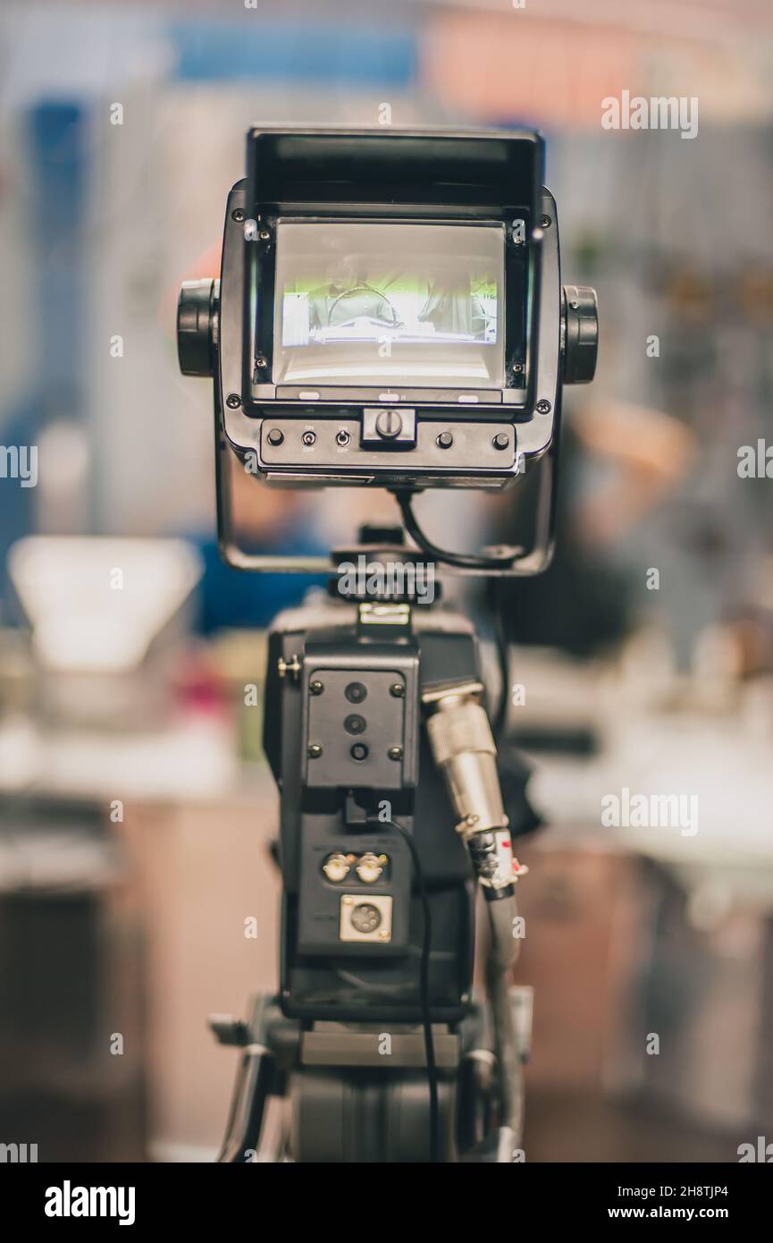 Behind the scene. Film camera in film studio Stock Photo - Alamy