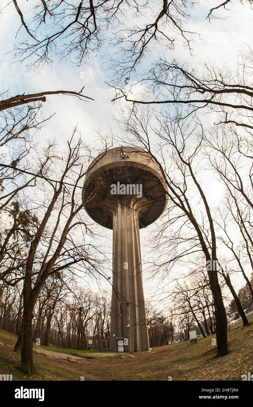 Tower tank for water supply in the forest. Fisheye lens perspective ...