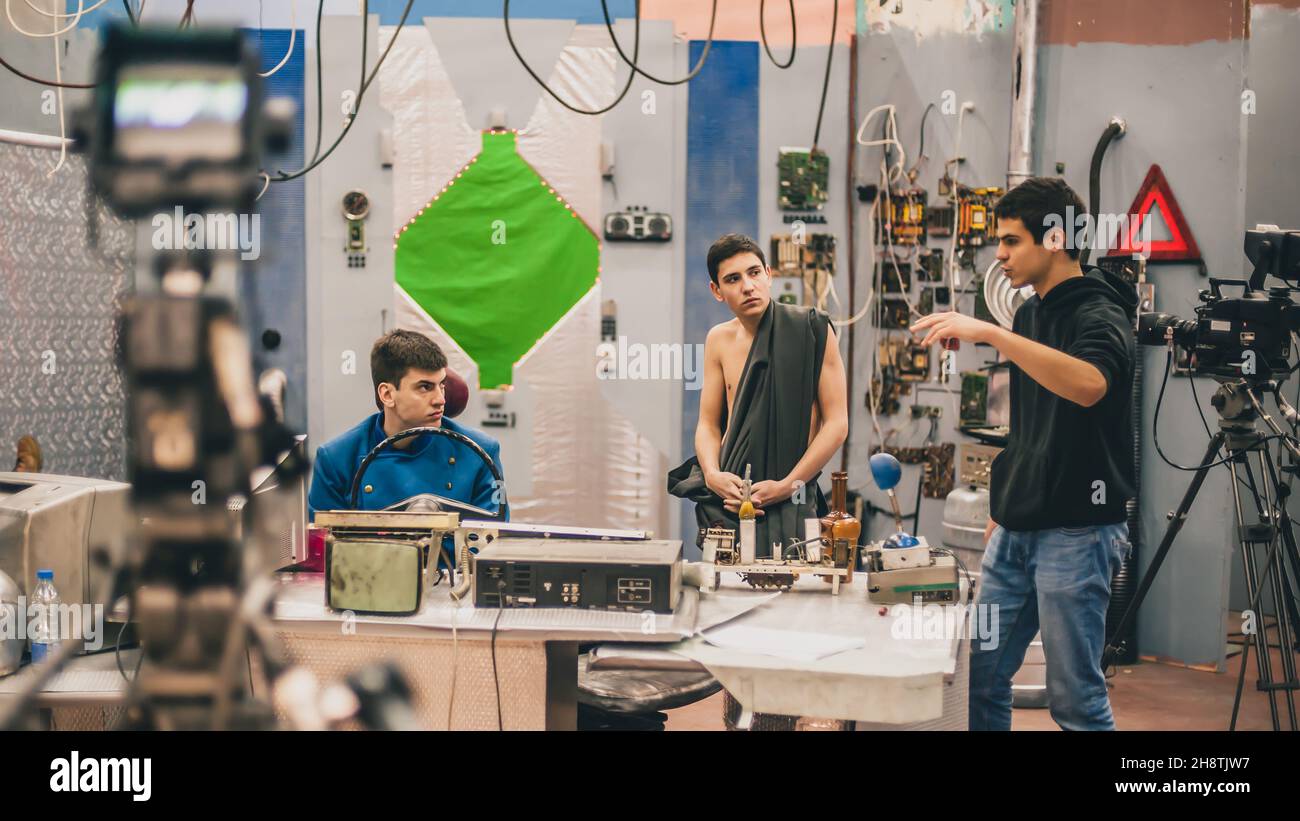Behind the scene. Film crew team filming movie scene on studio. Group ...
