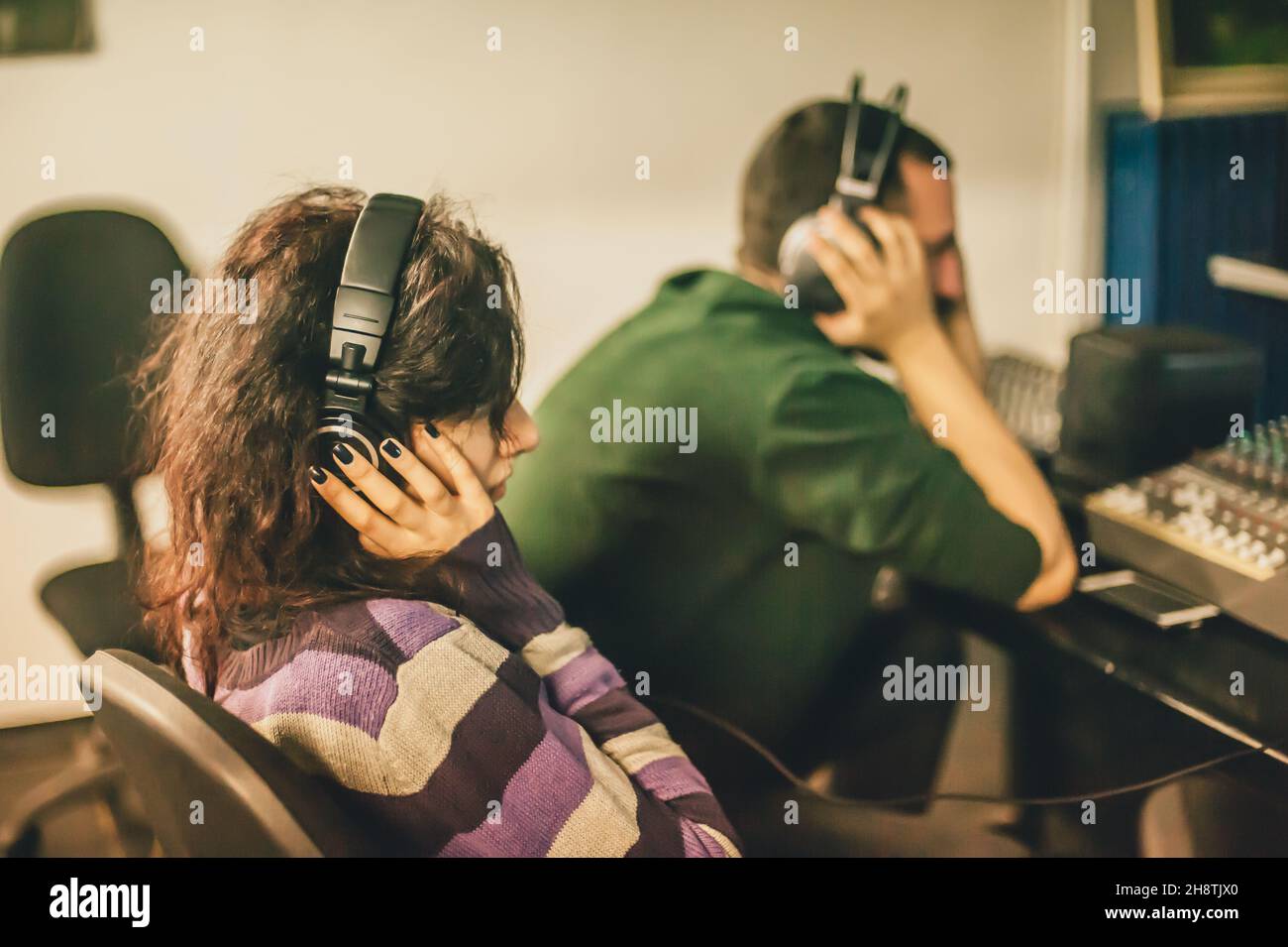 Behind the scene. Film crew in studio for film montage. Analog and ...