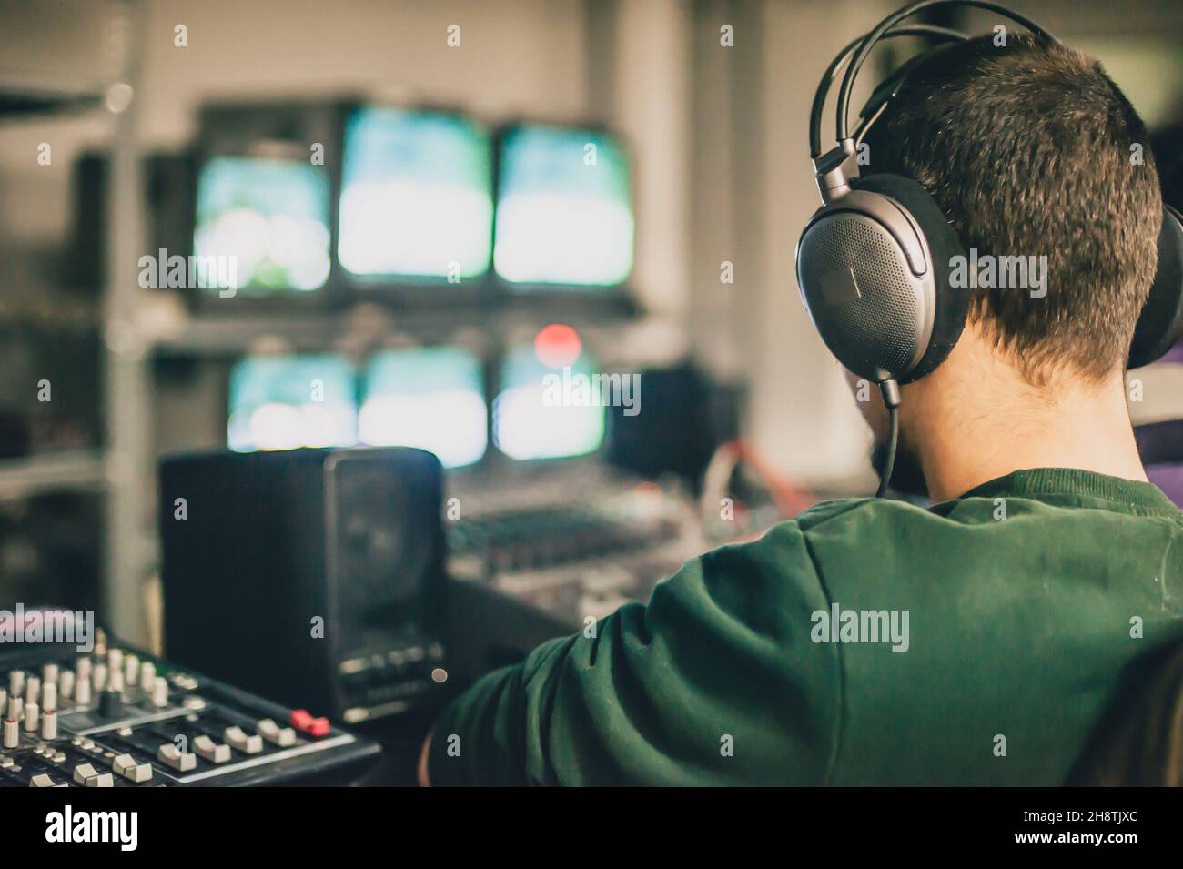 Behind the scene. Film crew in studio for film montage. Analog and ...