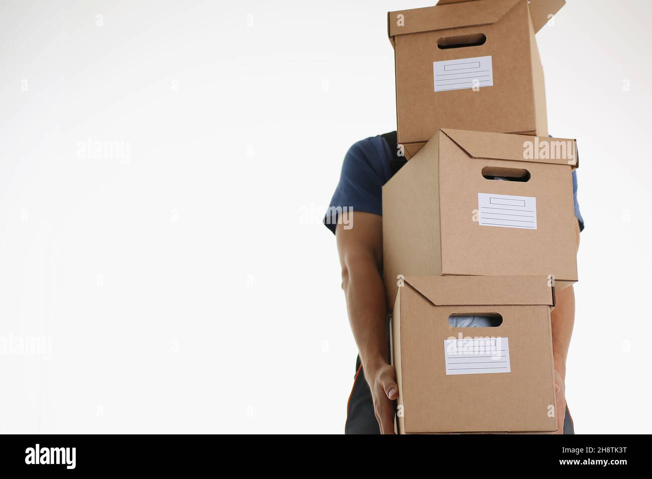 Postman carry bunch with cardboard packages for further delivery Stock ...