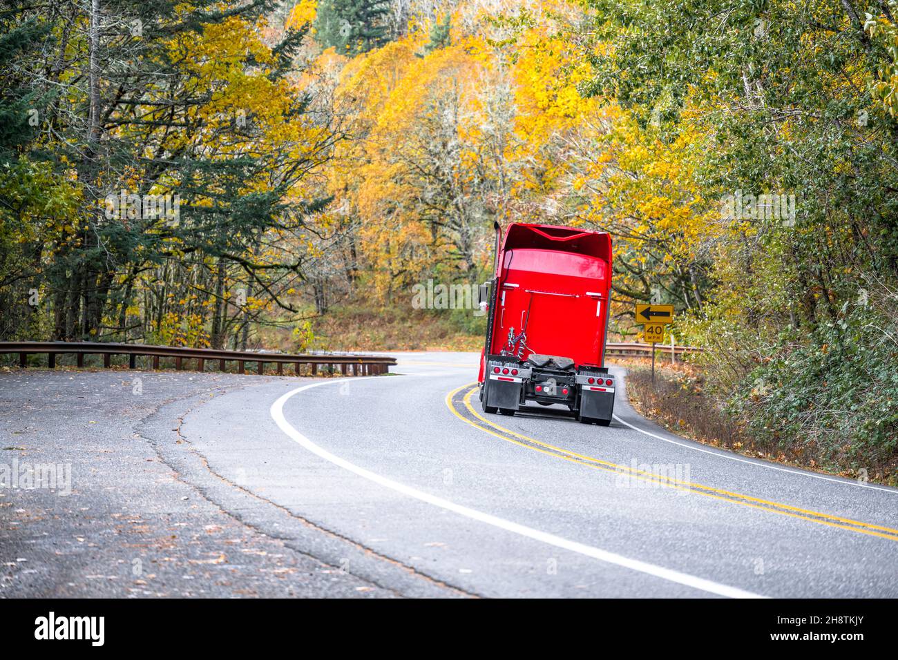 Industrial powerful bright red big rig semi truck tractor without semi ...