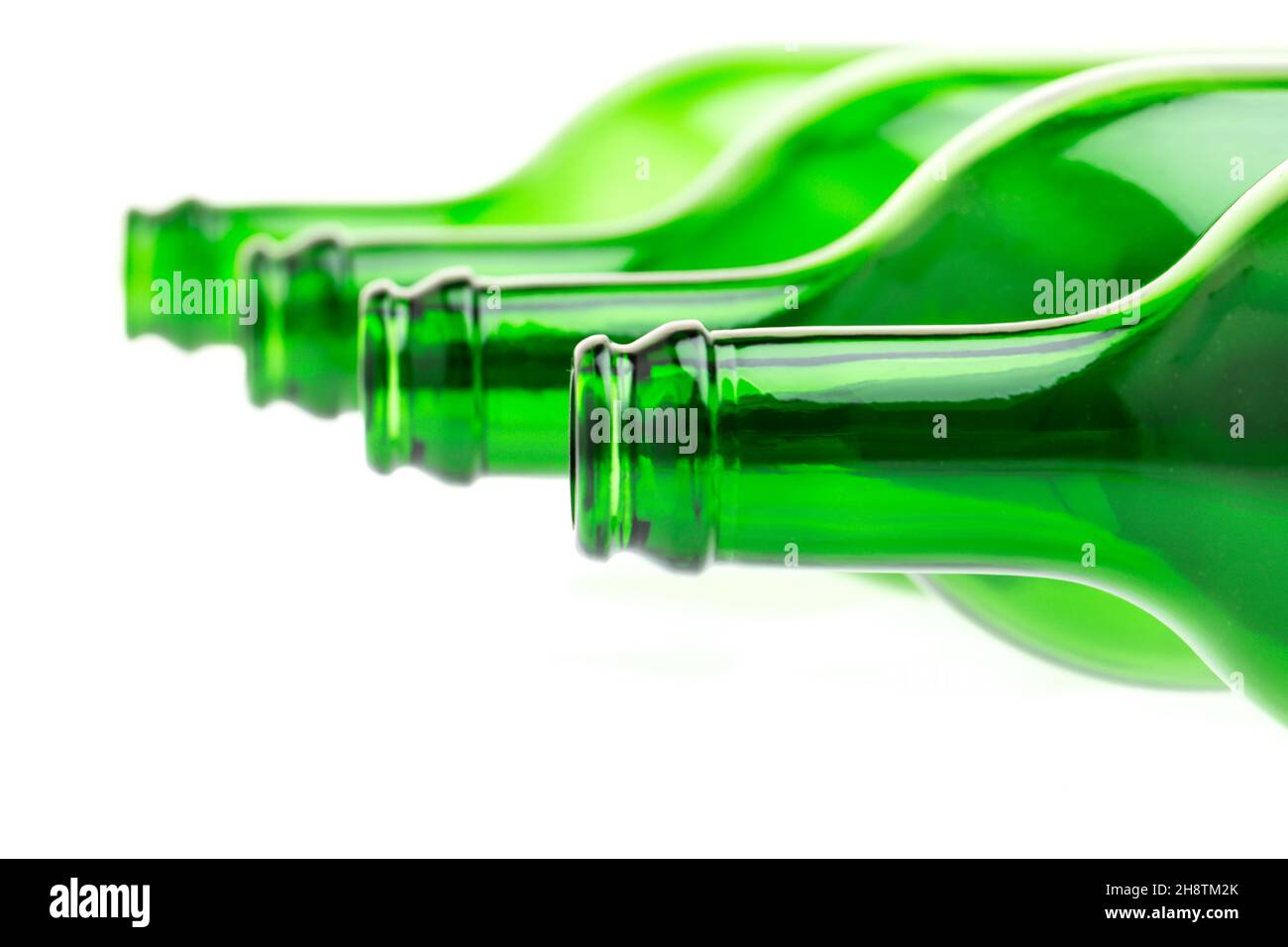 Many empty green bottles Stock Photo - Alamy
