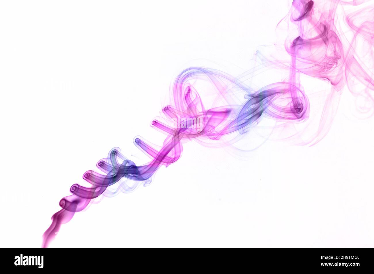 Abstract trace of a colorful smoke on a white background Stock Photo ...