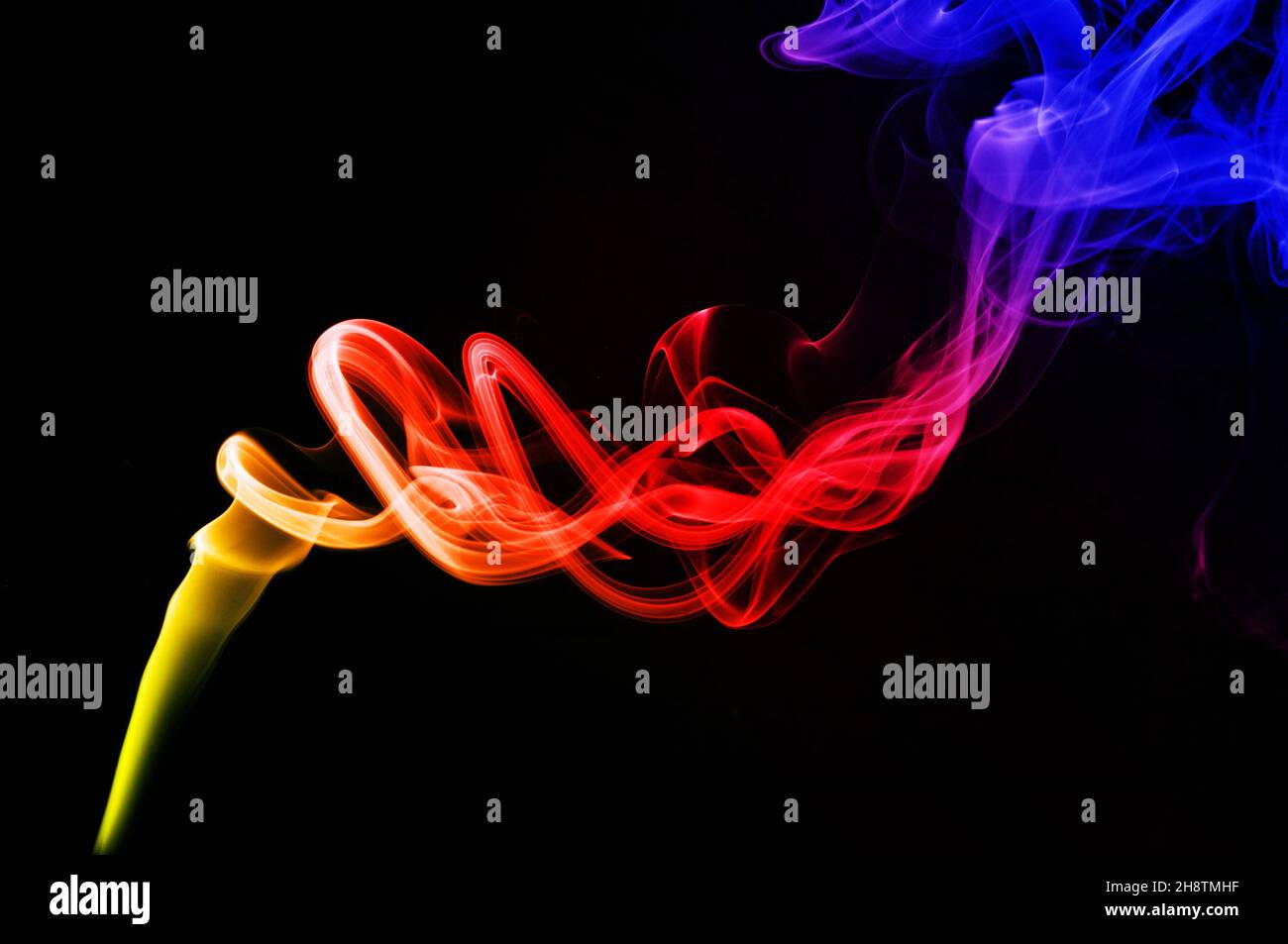 Abstract trace of a colorful smoke on a black background Stock Photo ...