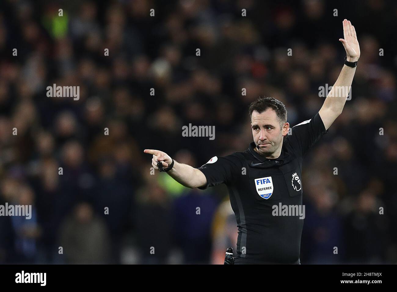 London, England, 1st December 2021. Referee, Chris Kavanagh gestures to ...