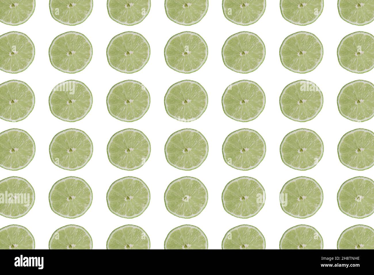 Fresh lime slices isolated on white background Stock Photo - Alamy