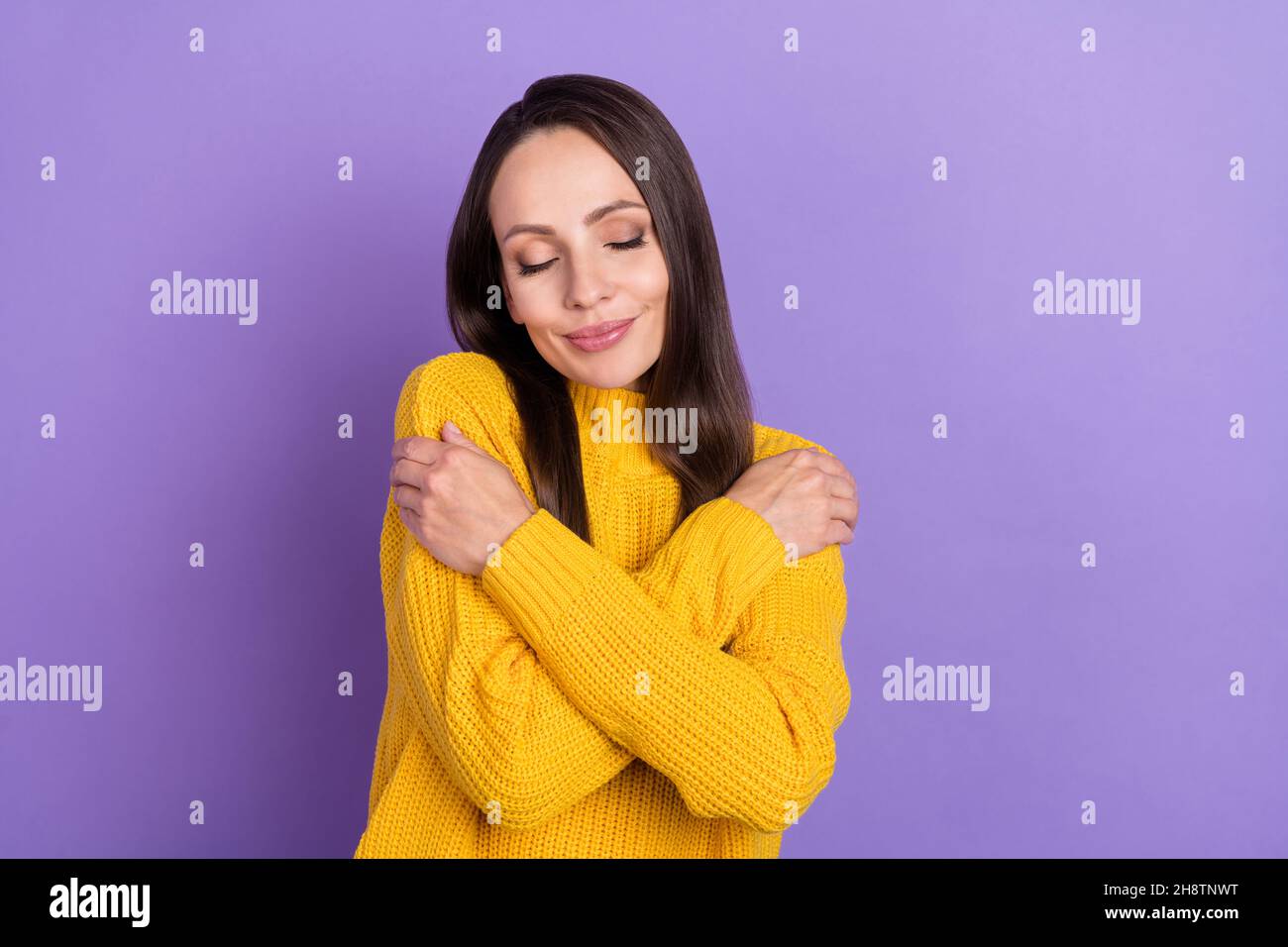 Photo Of Optimistic Brunette Mature Lady Hug Herself Wear Yellow