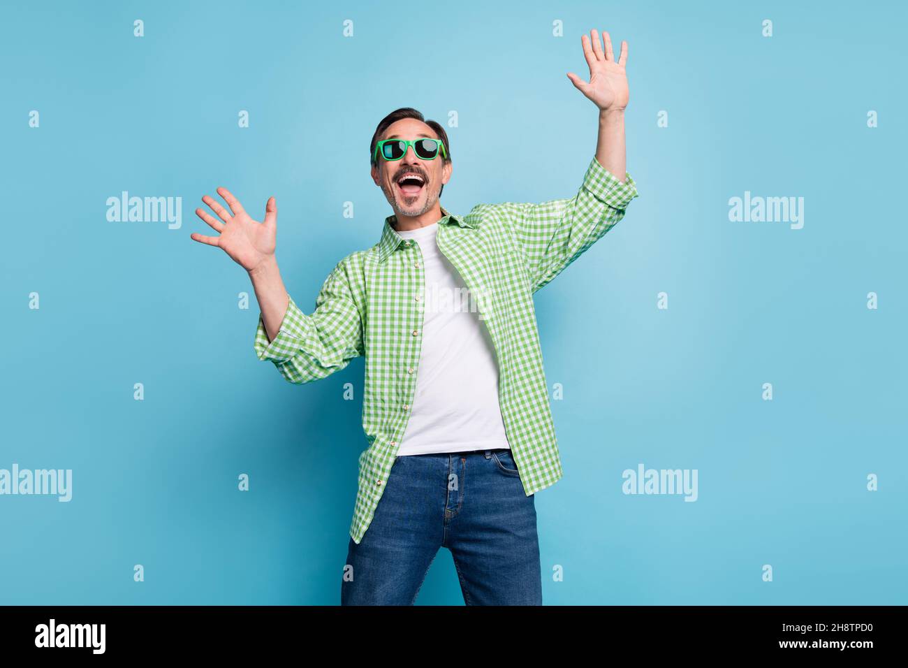 Portrait of attractive cheerful funky man dancing fooling having fun ...