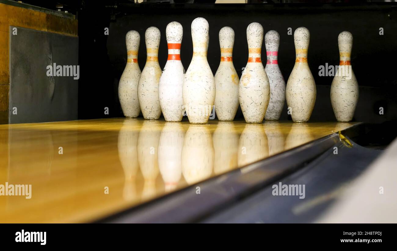 White pins are on the bowling line. Media. Bowling pins are in a row ...