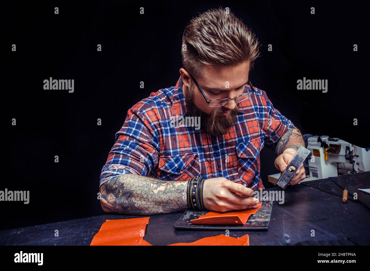Leather Tanner working with leather Stock Photo - Alamy