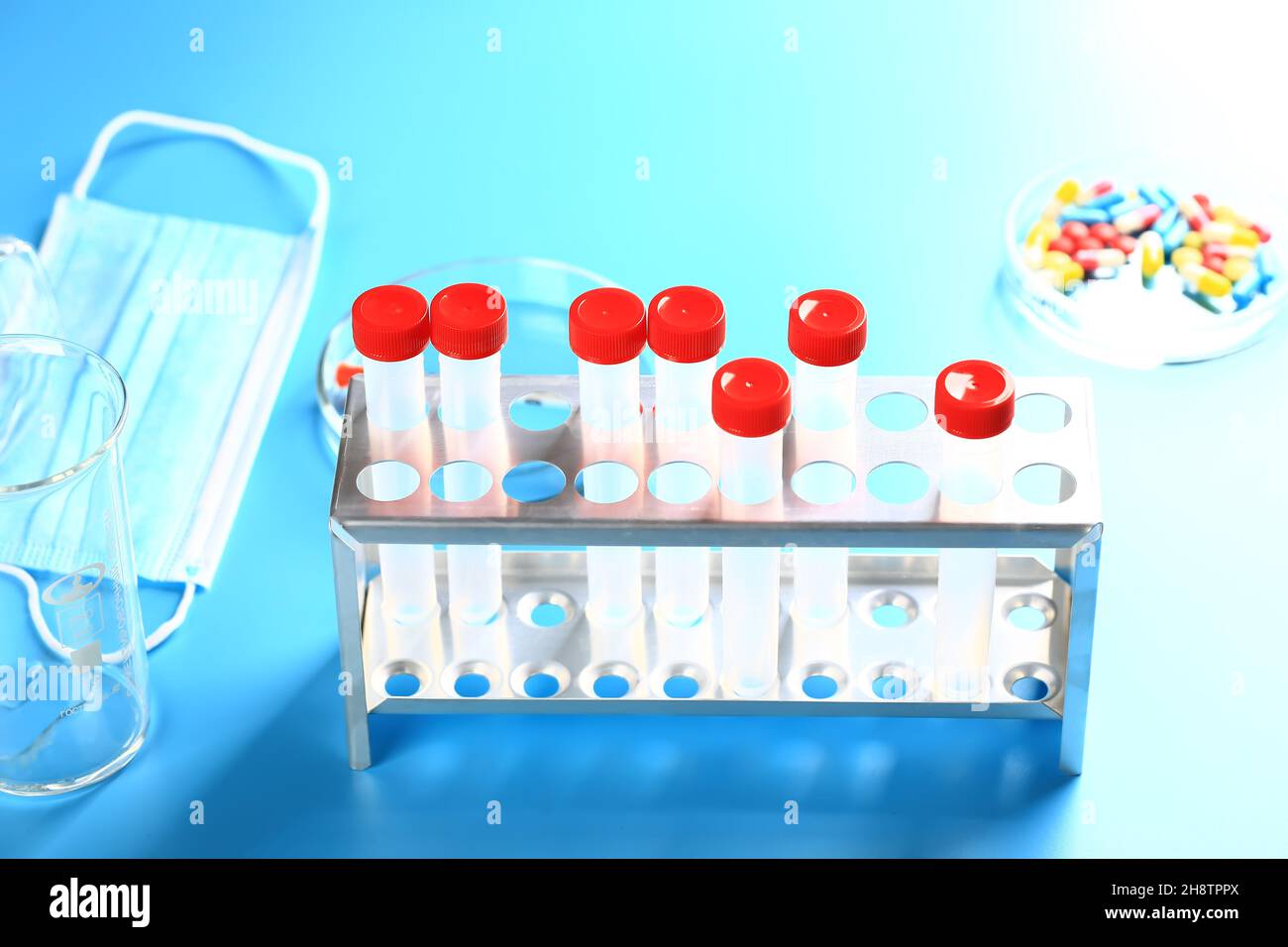 abstract medical background with test tubes for analyzes. Frame flare ...