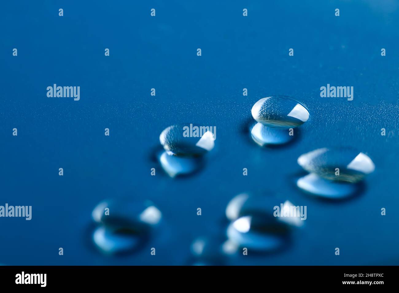 Abstract blurred blue background with drops Stock Photo - Alamy