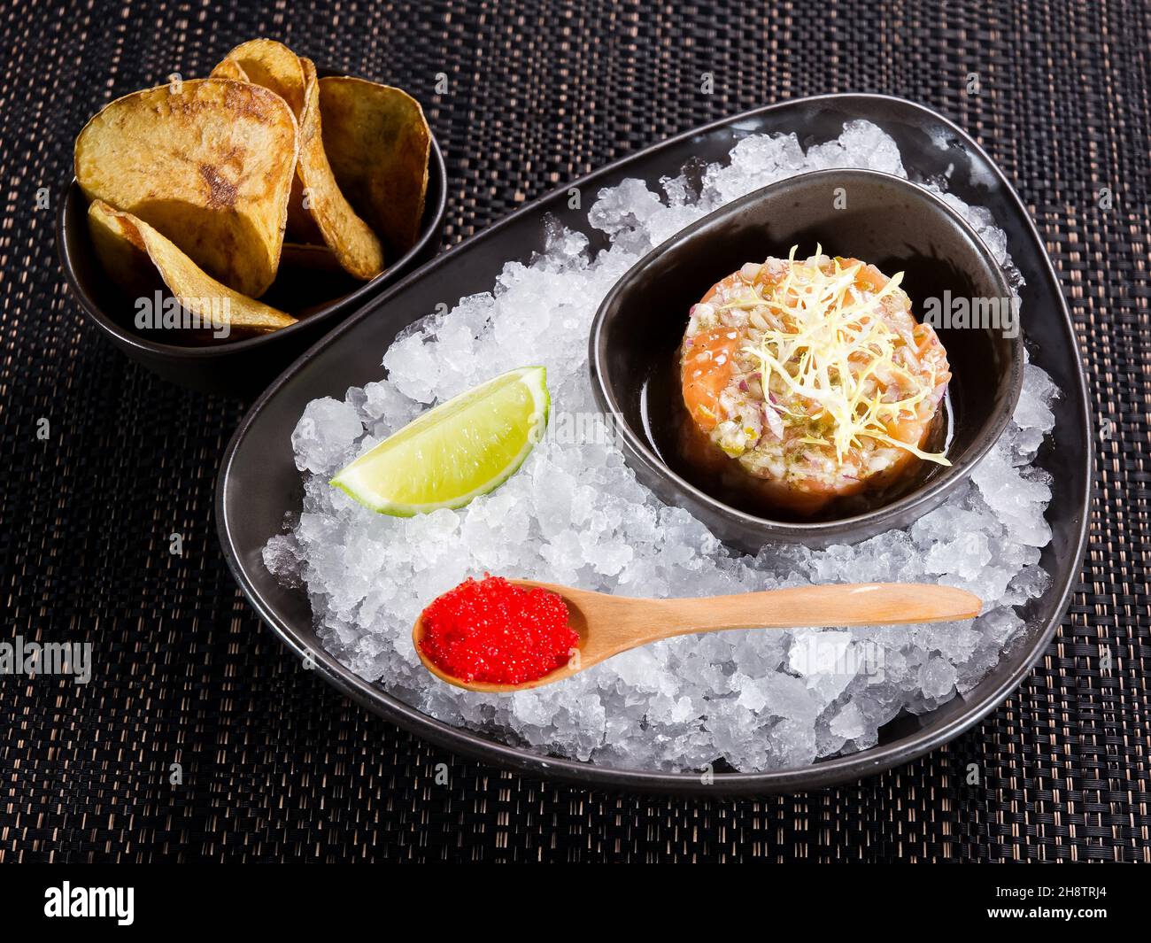 fresh salmon tartare, raw minced salmon fillet with capers and chopped ...