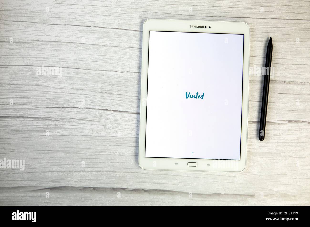 The Netherlands, December 2021 Vinted mobile app on white digital ...