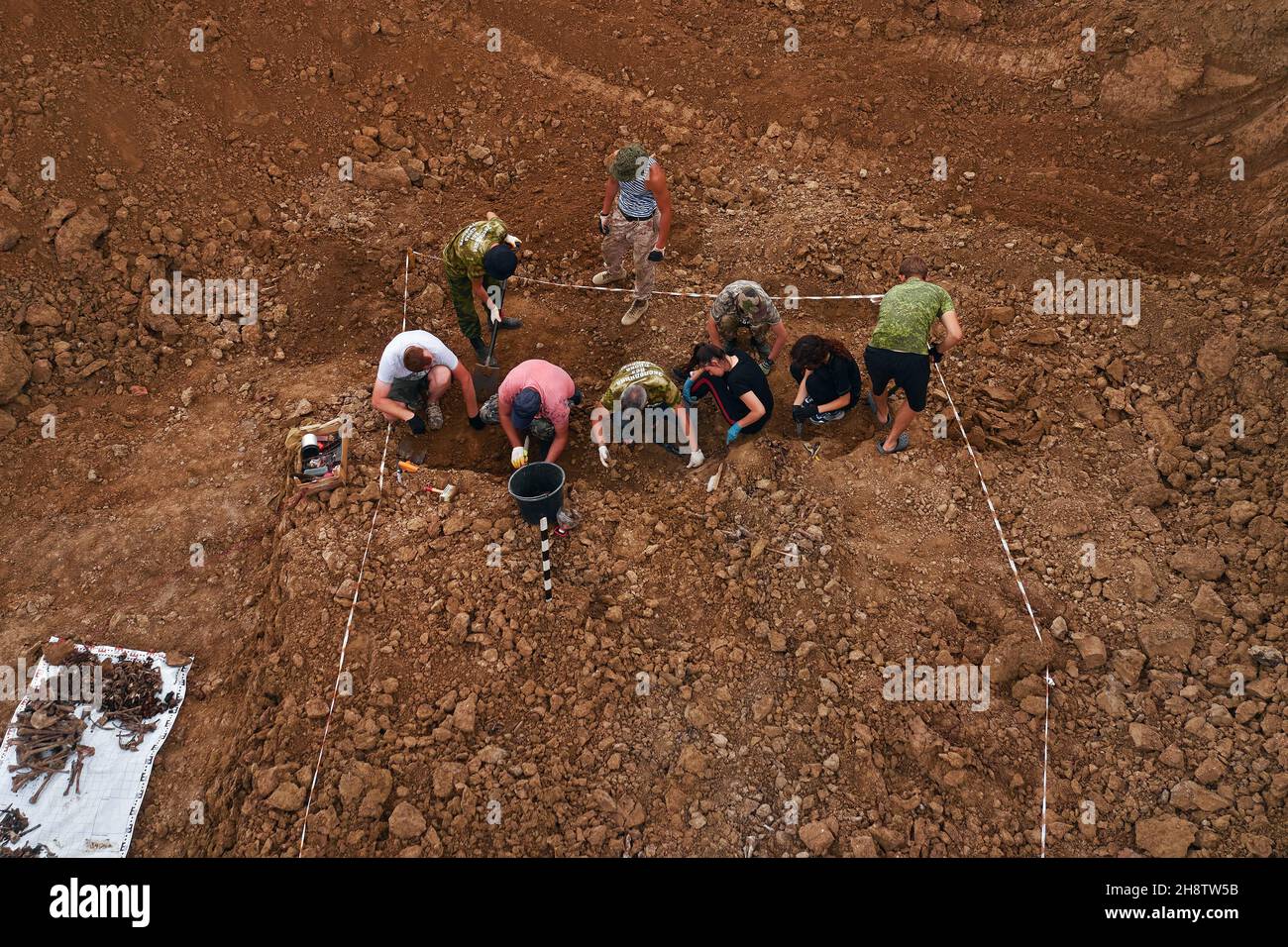 Excavations at the site of a war crime. Site of a mass shooting of ...