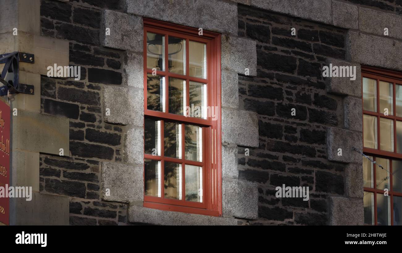 Exterior of an old building with brick frames around its windows Stock ...