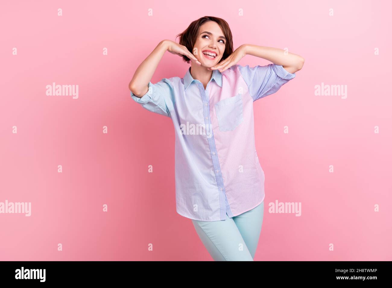 Photo of young cheerful woman happy positive smile hands touch chin ...