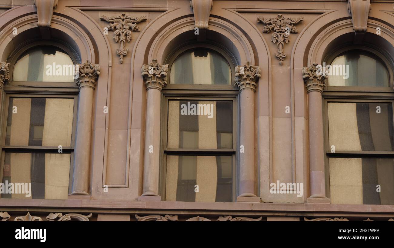 Intricate modern building with classical style arches and columns in ...