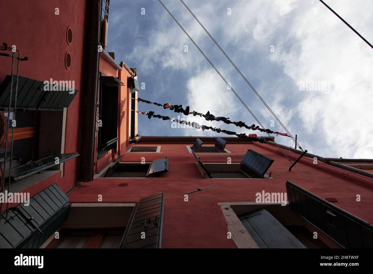 Building view from below with open windows and beautiful sky Stock ...