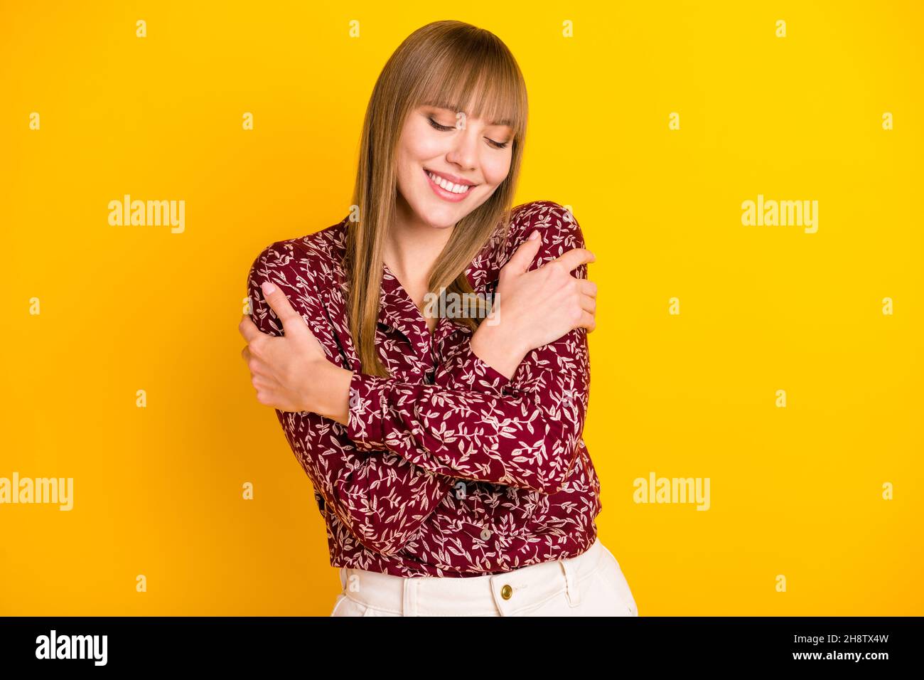 Photo portrait of blonde woman dreaming hugging herself in printed ...