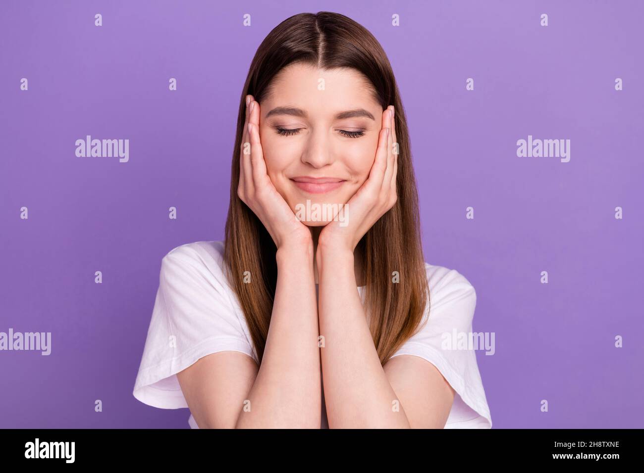 Portrait of attractive dreamy cheerful girl touching cheeks isolated ...