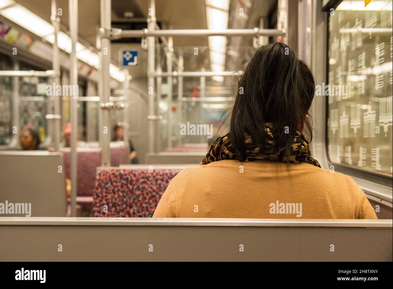 Berlin, Germany. Young adult woman commuting through the Cities ...