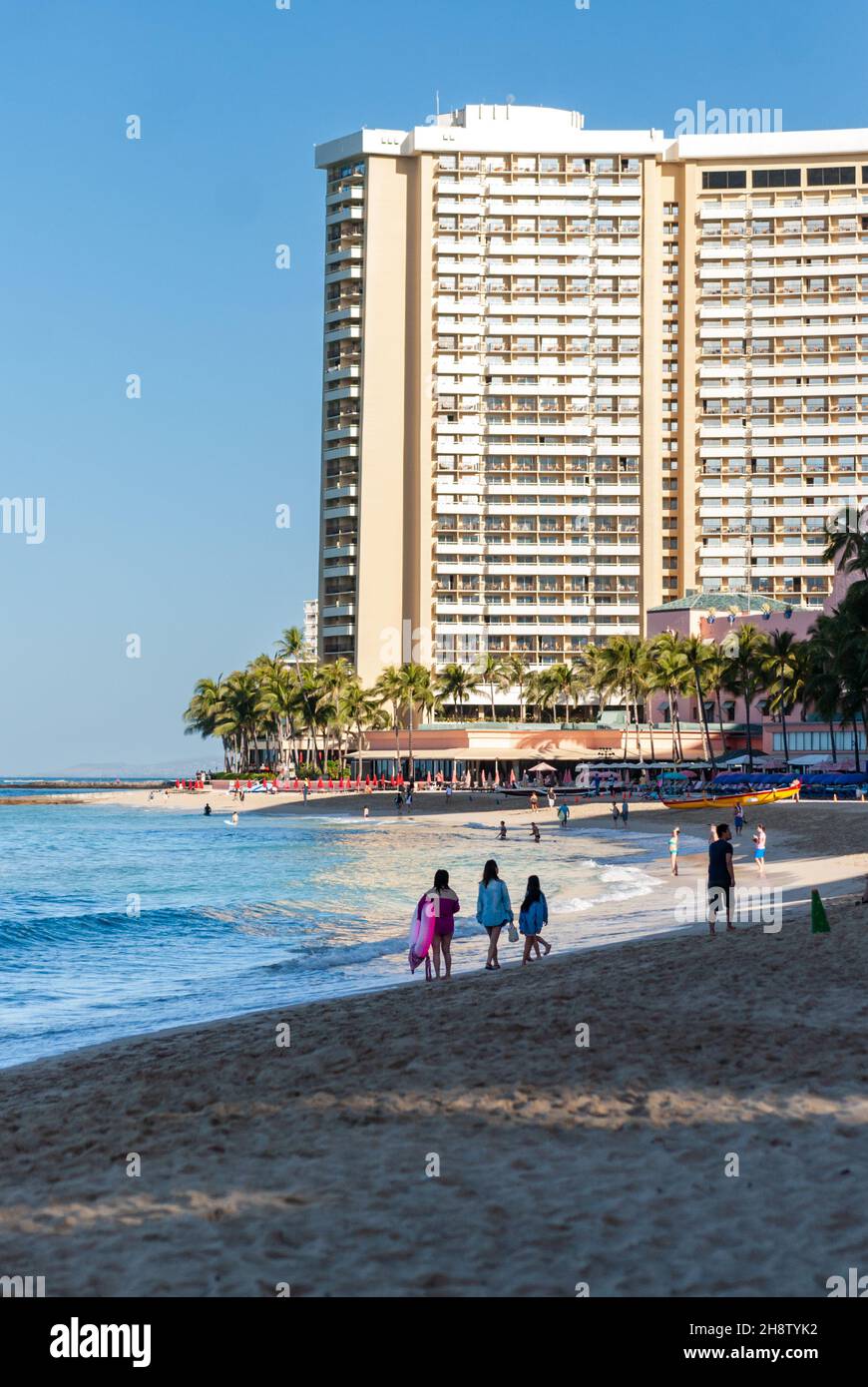 Honolulu, Hawaii - May 02, 2015: Tourist enjoying world famous Waikiki ... Honolulu, Hawaii - May 02, 2015: Tourist enjoying world famous Waikiki ...