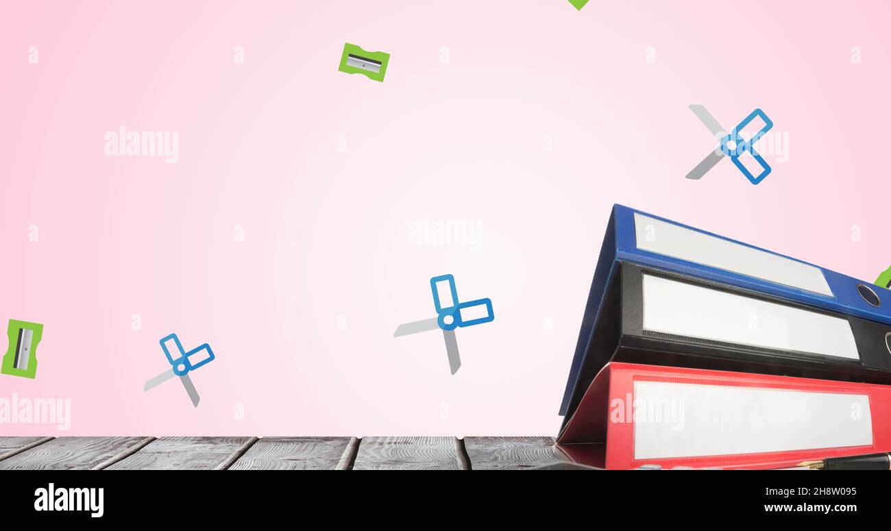 Image of office files and office items over wooden surface on pink ...