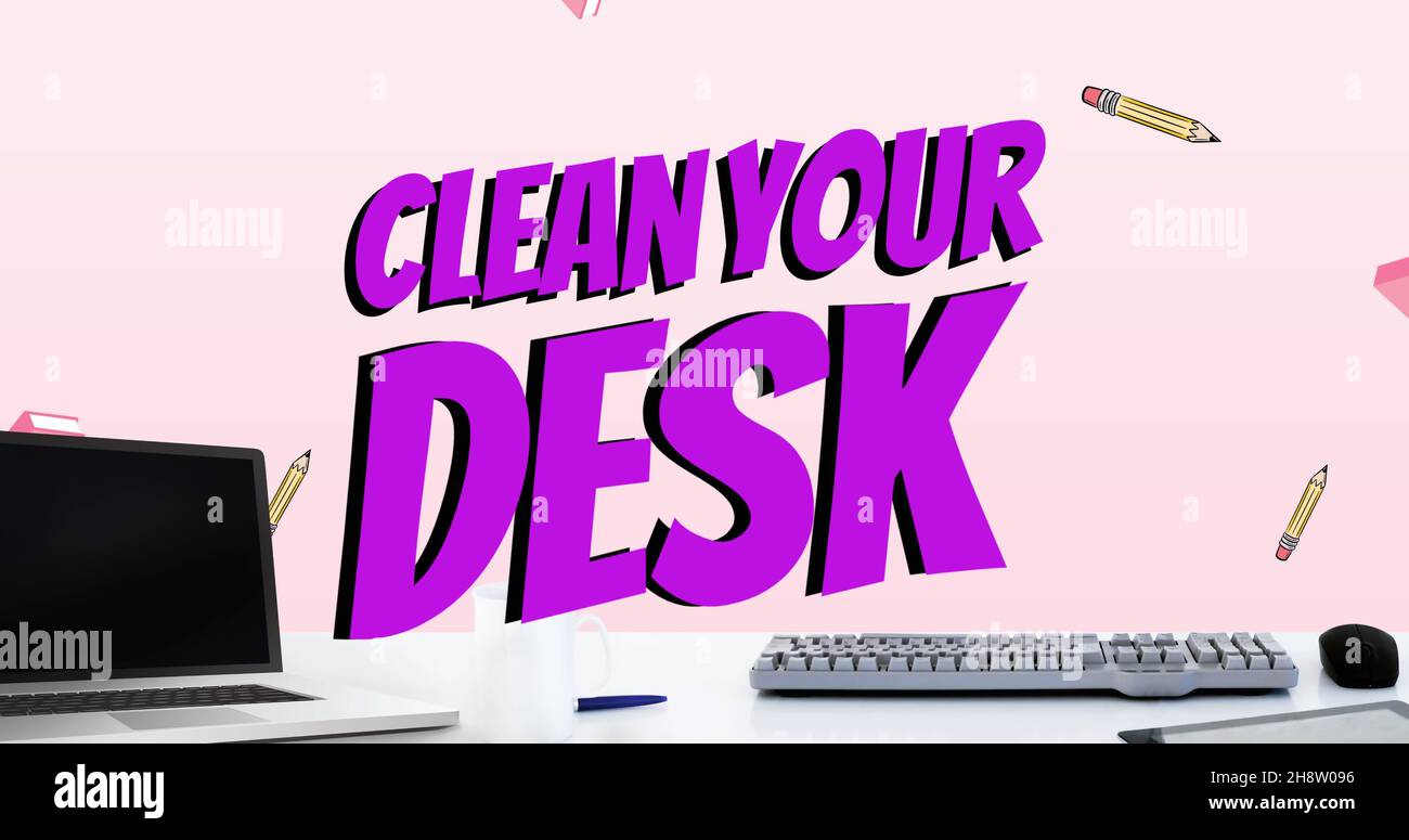 Image of clean your desk text over laptop and office items on pink ...