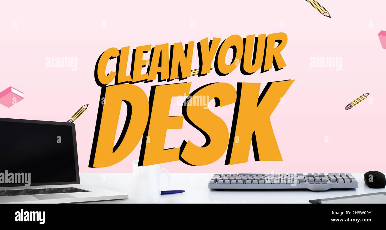 Image of clean your desk text over laptop and office items over pink ...