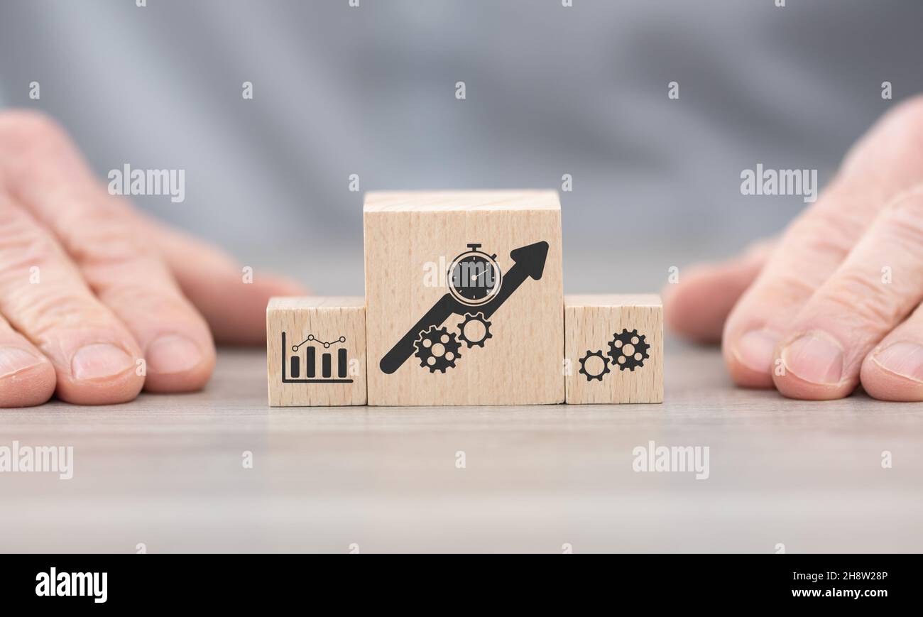 Wooden blocks with symbol of productivity concept Stock Photo - Alamy