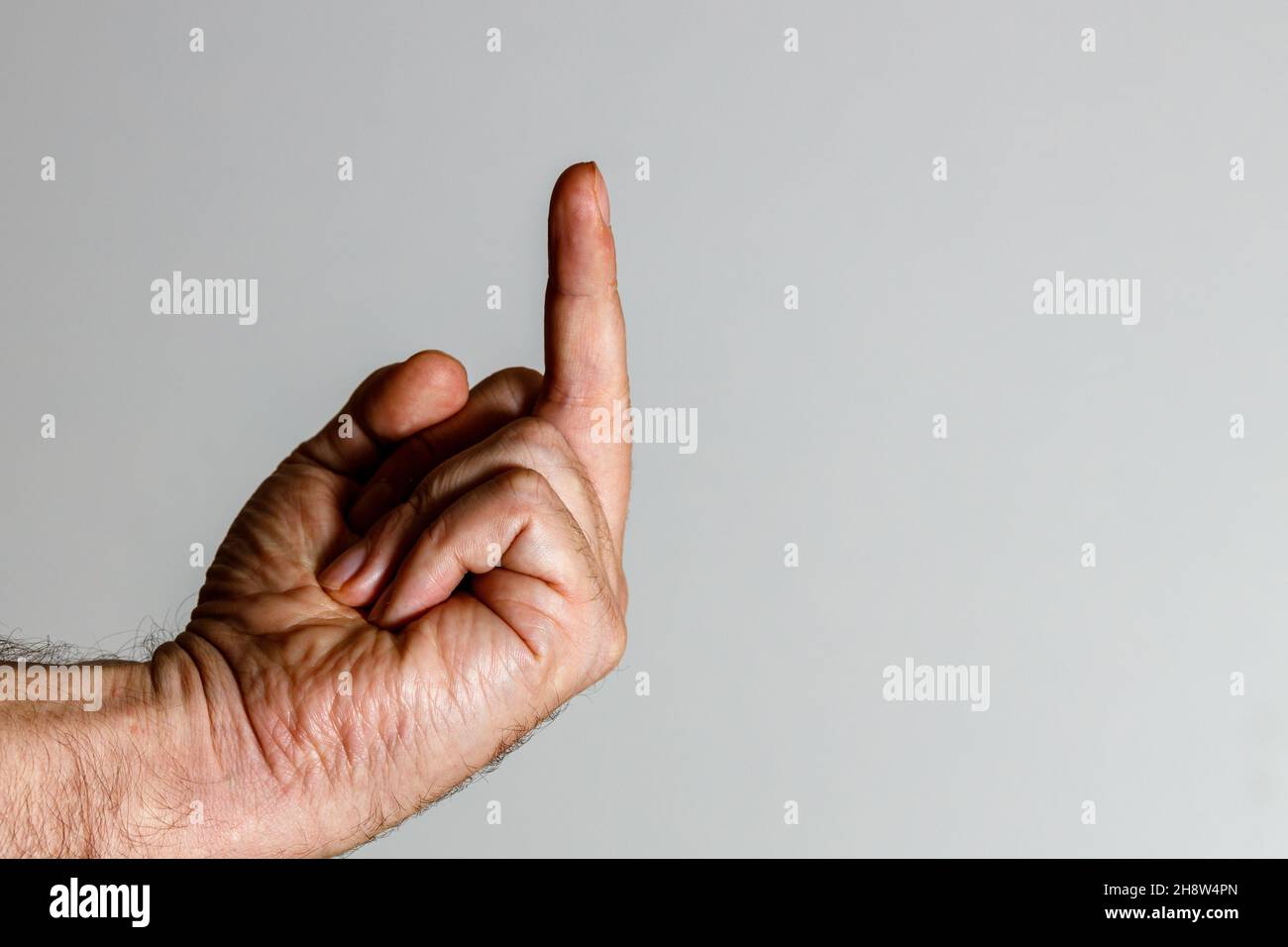 A hand with a gesture Stock Photo - Alamy
