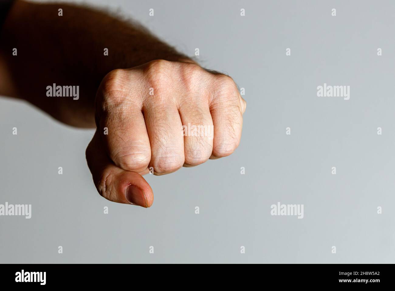 Fist pose hi-res stock photography and images - Alamy