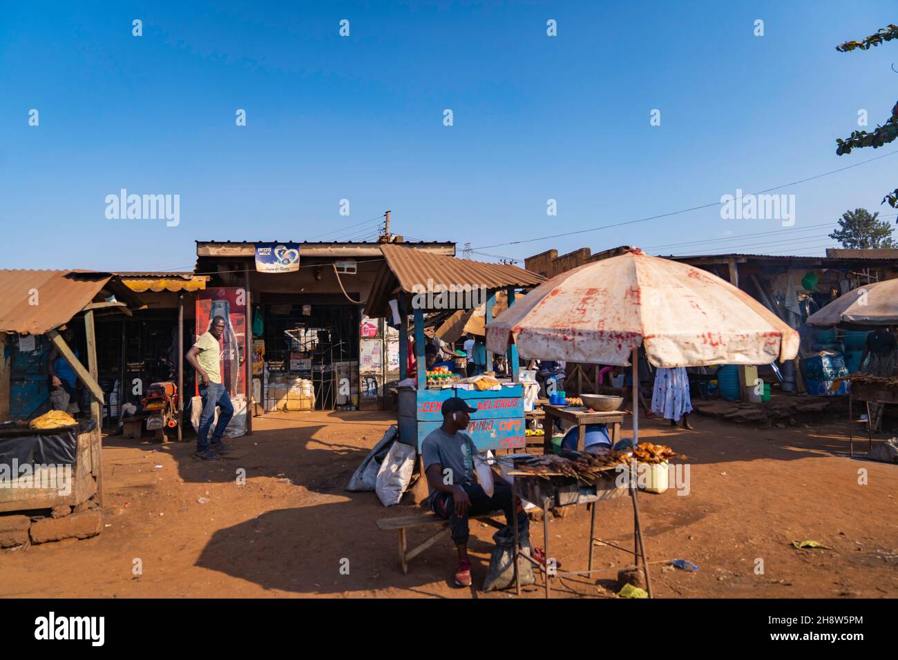 Fresh goat meat known as Muchomo is cooking in Uganda Stock Photo - Alamy