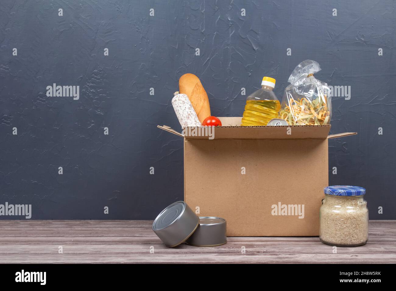Food bank, food delivery concept. Donation box with different food ...