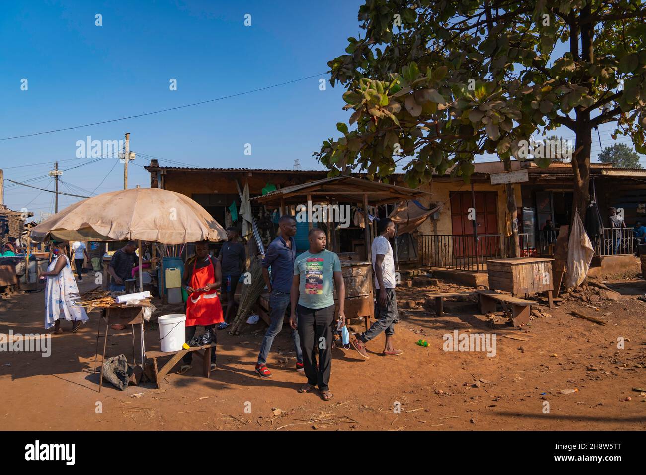 A Uganda Rolex being made by the side of the road. A rolex is a ...